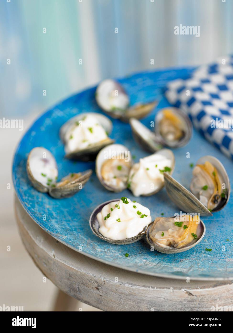 Littleneck clams with citrus fruit mayonnaise Stock Photo - Alamy