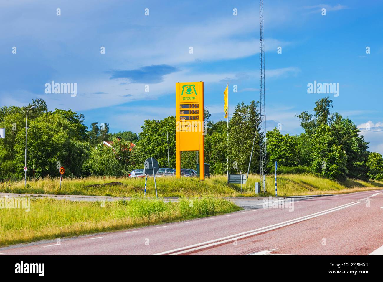 Gas station with yellow Preem sign displaying fuel prices, located by ...