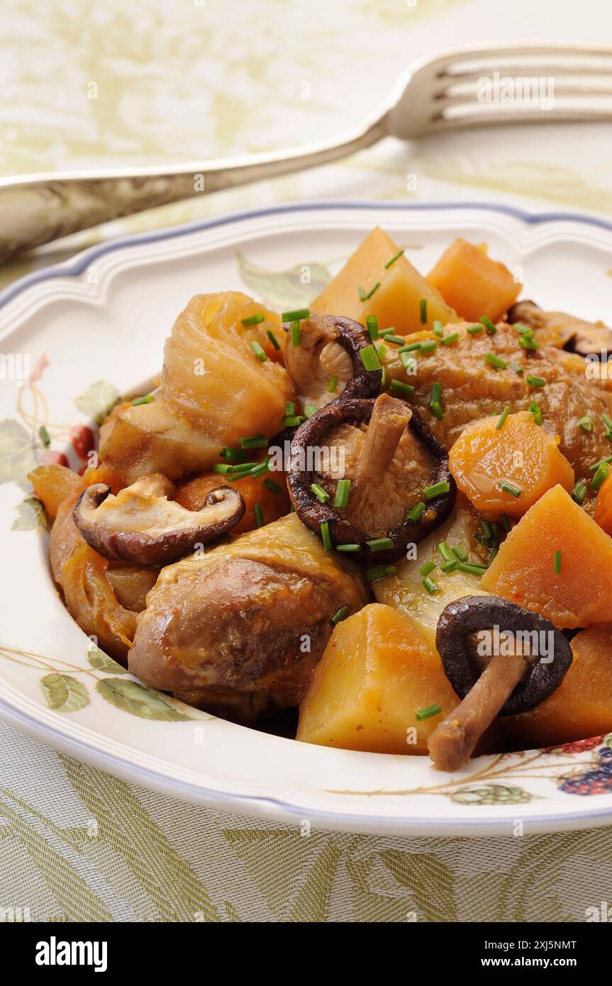 Guinea-fowl cooked with maple syrup and old-fashioned vegetables Stock ...