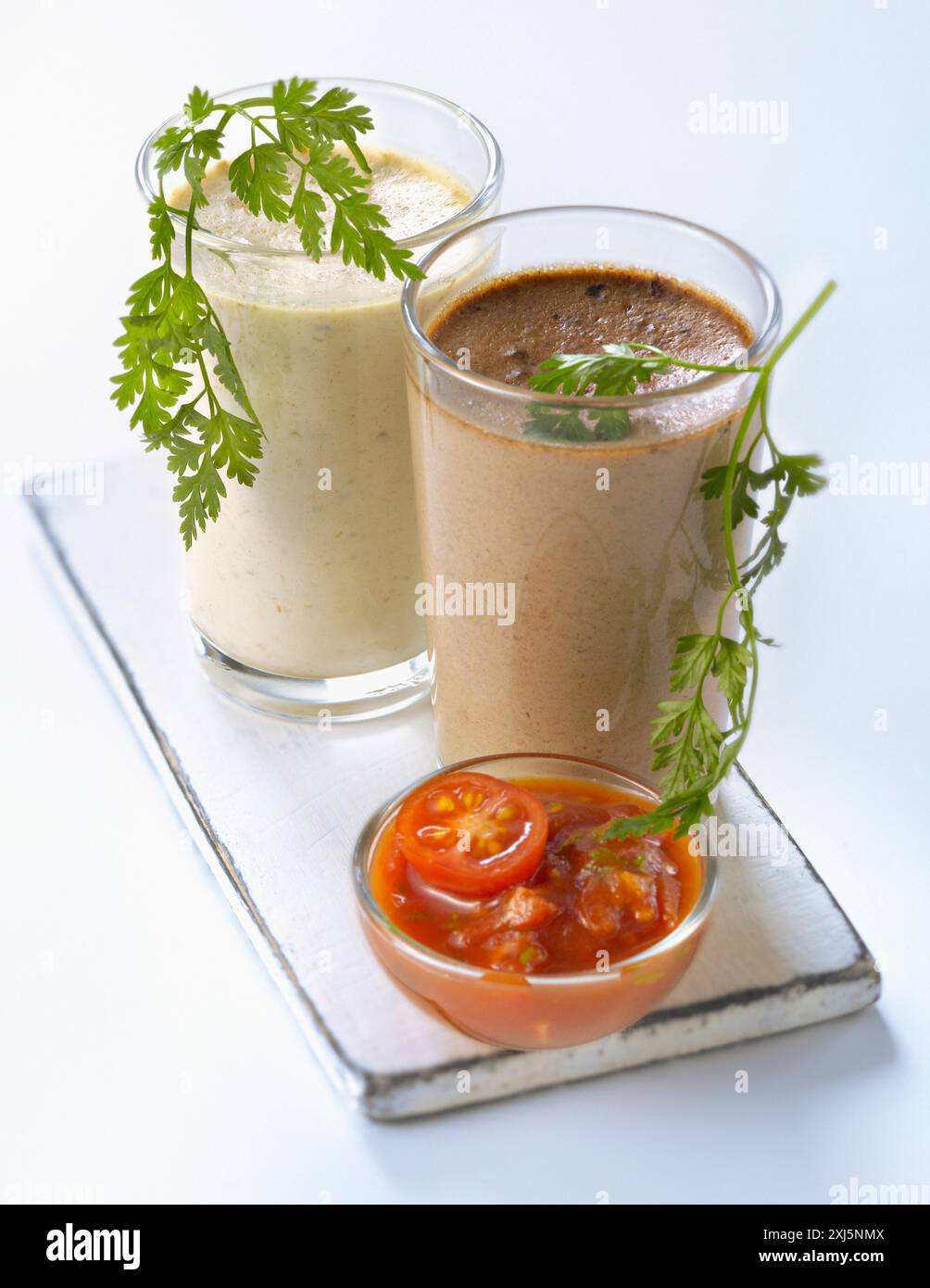 Tapenade panacottas ,tomato and chervil sauce Stock Photo - Alamy