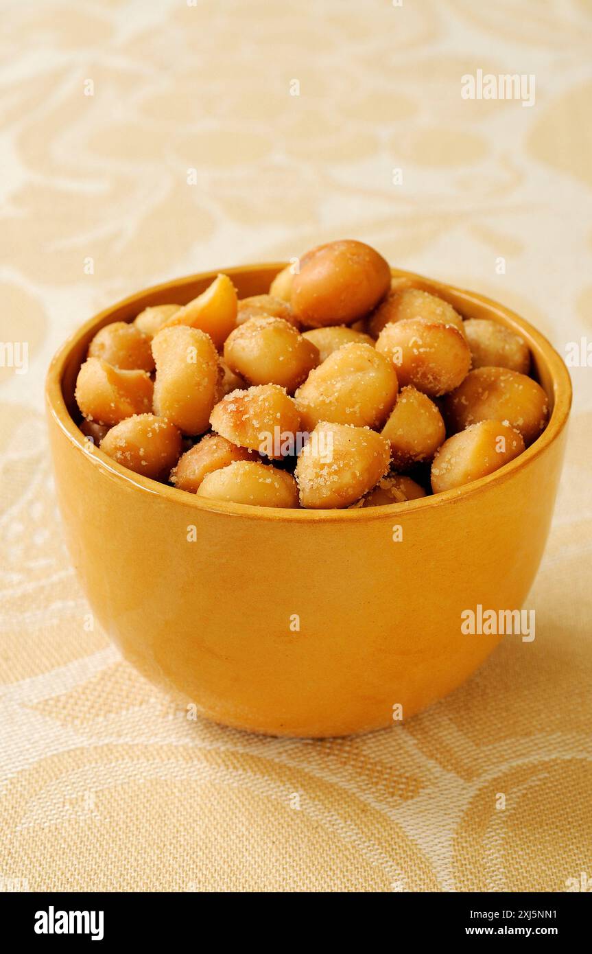 Grilled and salted macadamia nuts Stock Photo - Alamy