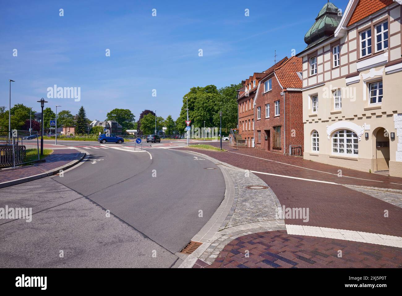 Street with buildings, cycle path and roundabout in Stade, Hanseatic ...