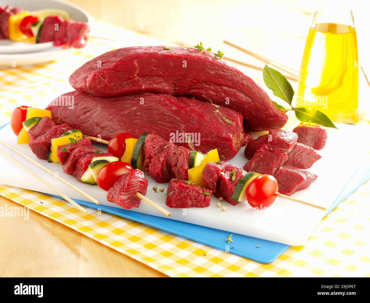 Preparing beef brochettes Stock Photo - Alamy