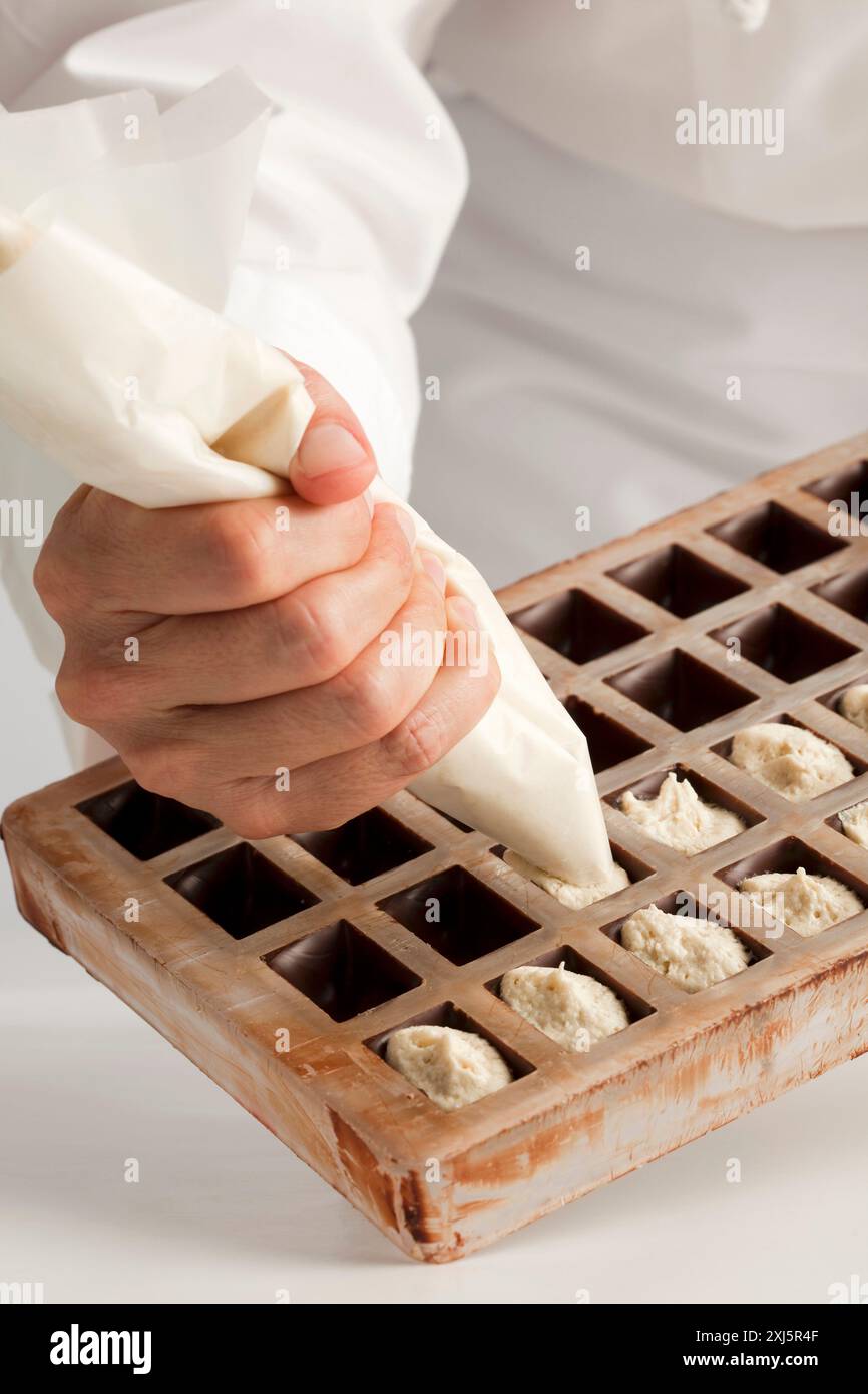 Hand piping chocolate hi-res stock photography and images - Alamy