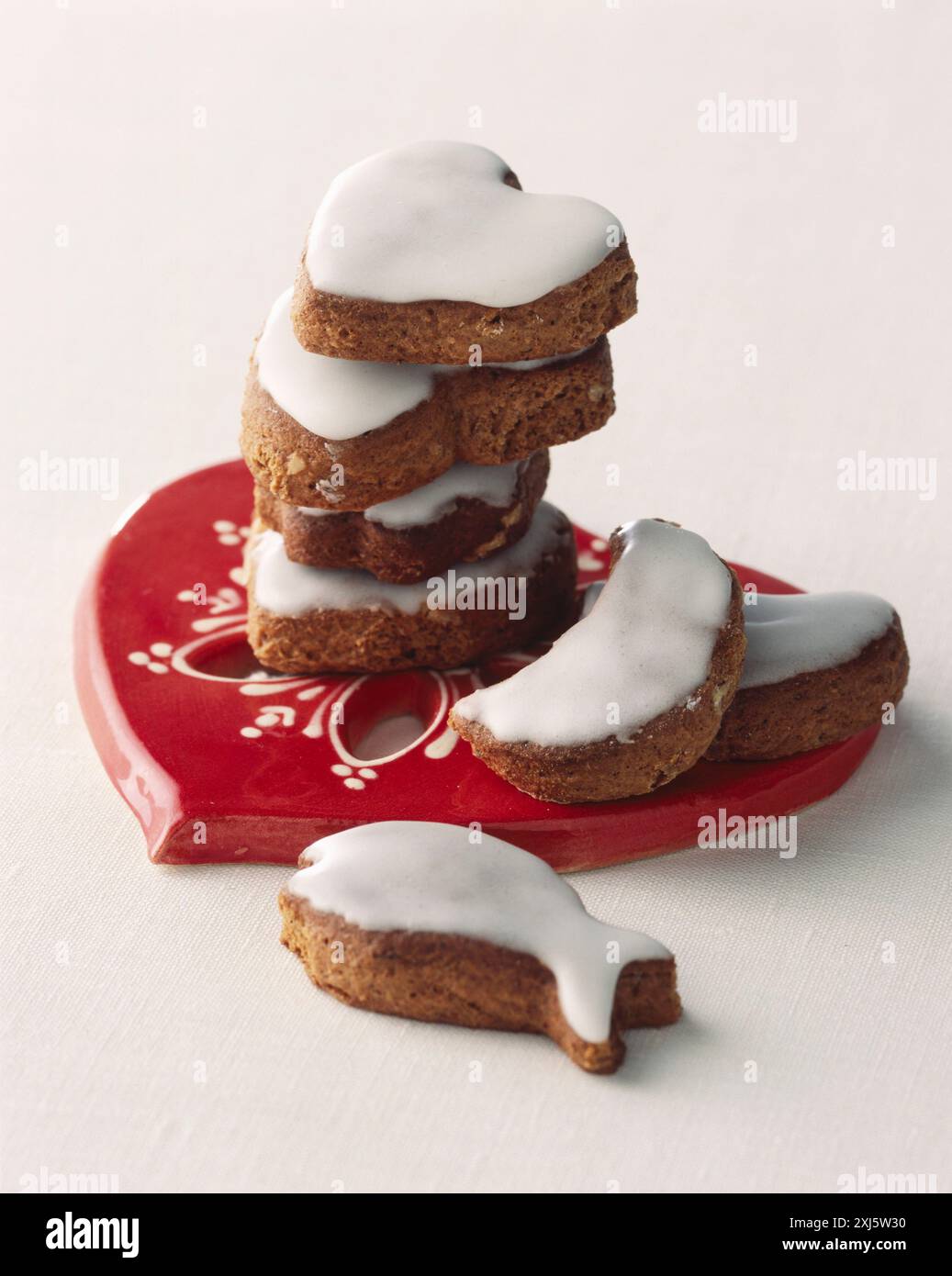 Gingerbread cookies coated with icing sugar Stock Photo - Alamy