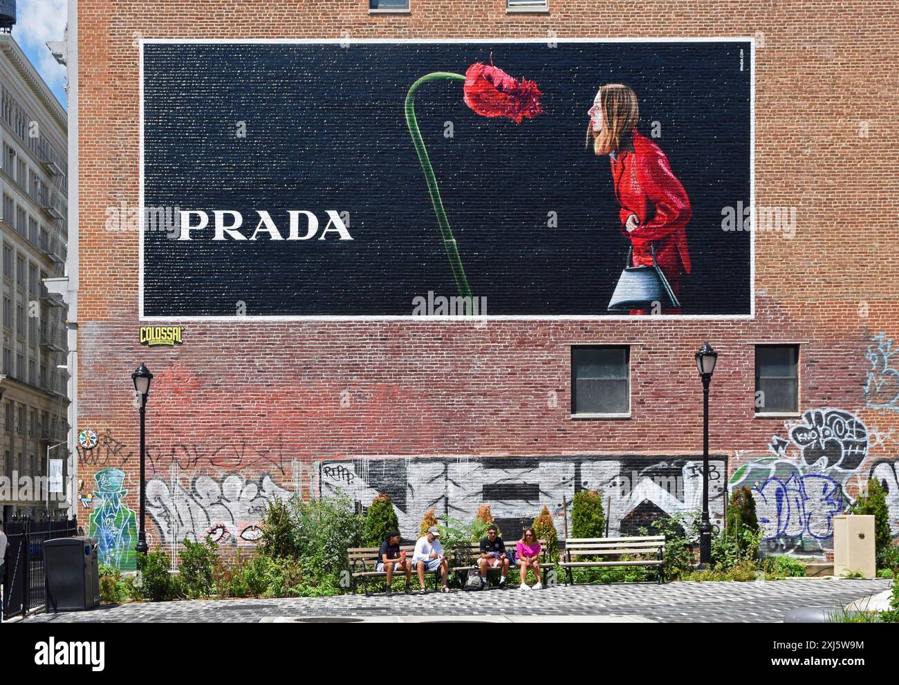 Hand-painted mural, woman with handbag standing in front of flower ...