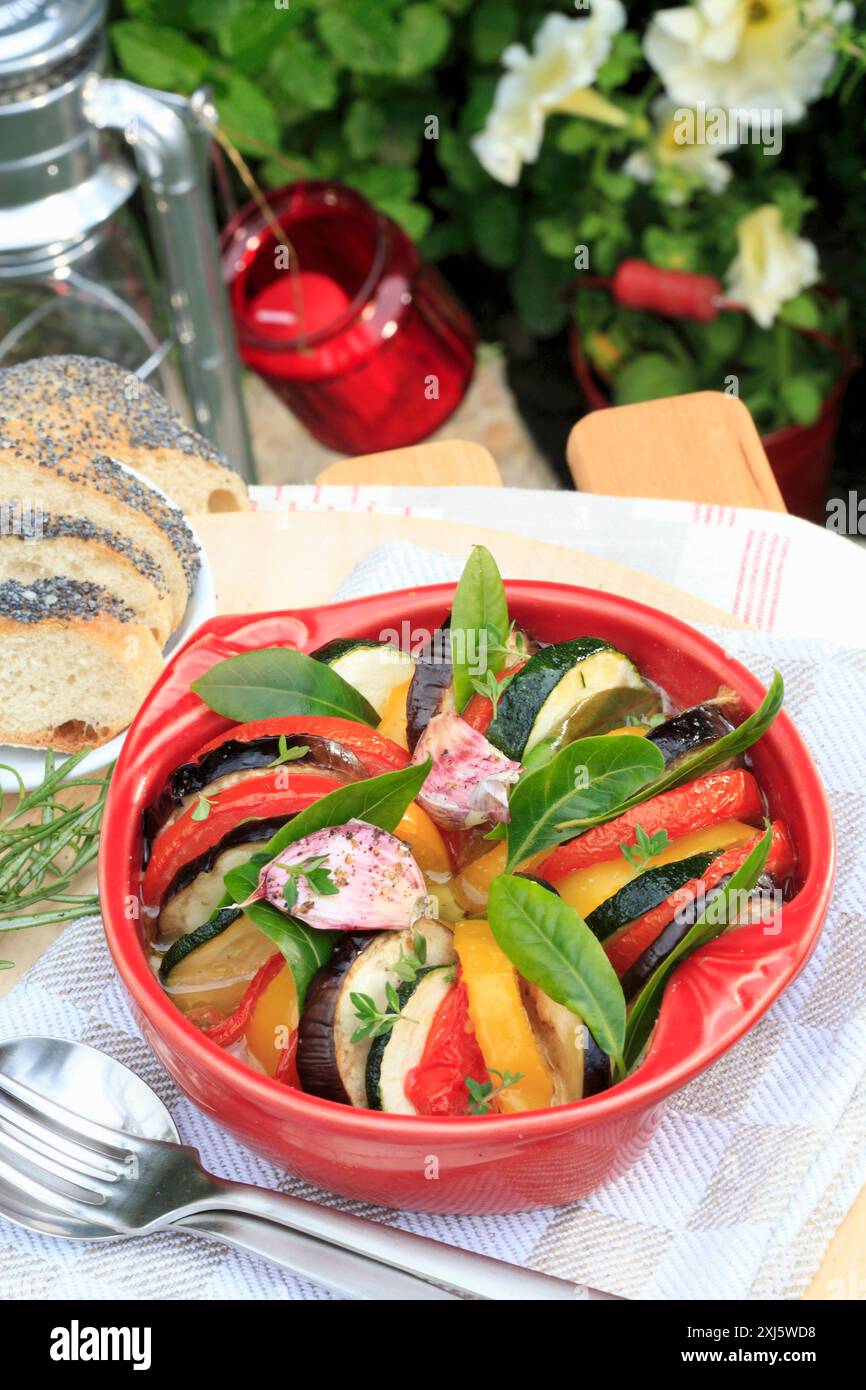 Cold vegetable Tian with garlic and bay leaves Stock Photo - Alamy