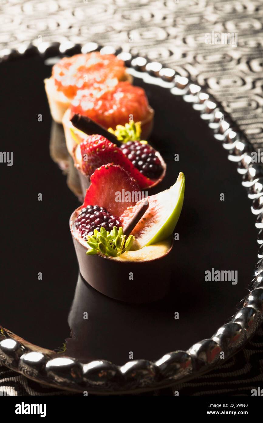 Fruit and chocolate delicacies Stock Photo - Alamy