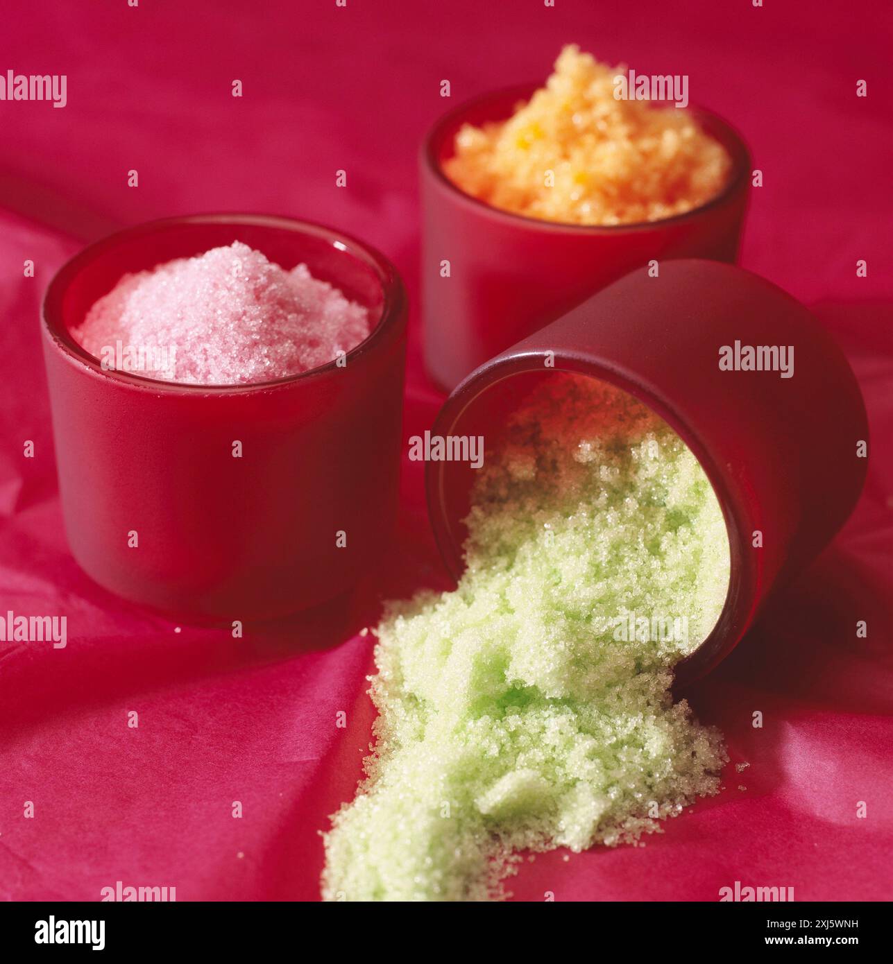 Bowls of different colored sugar Stock Photo - Alamy
