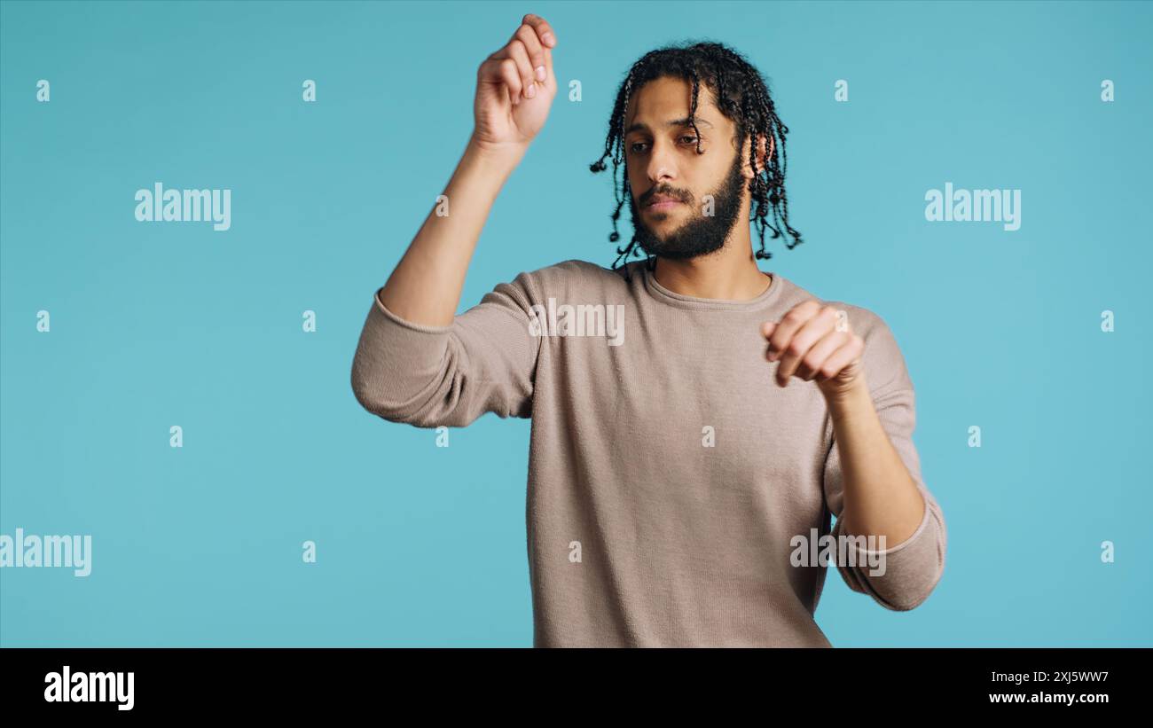 Middle Eastern conductor performing classical music concert following ...