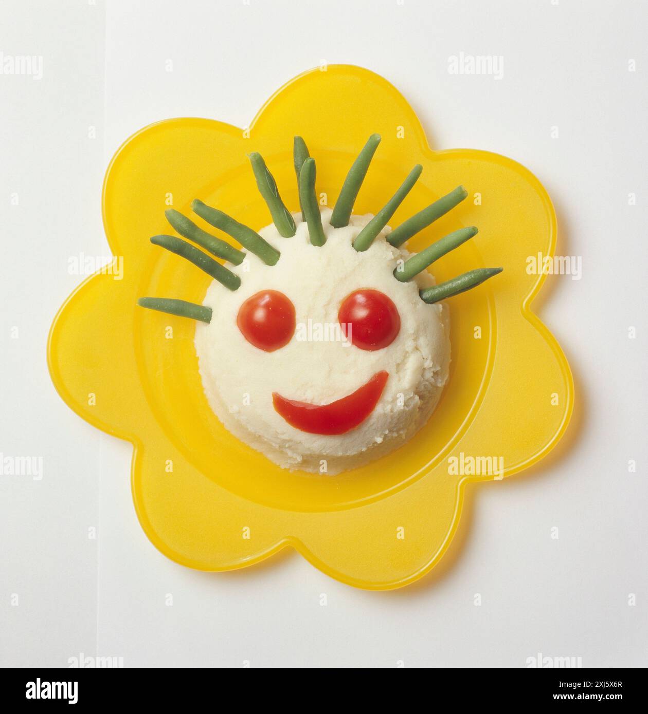 Funny face mashed potatoes with vegetables Stock Photo - Alamy