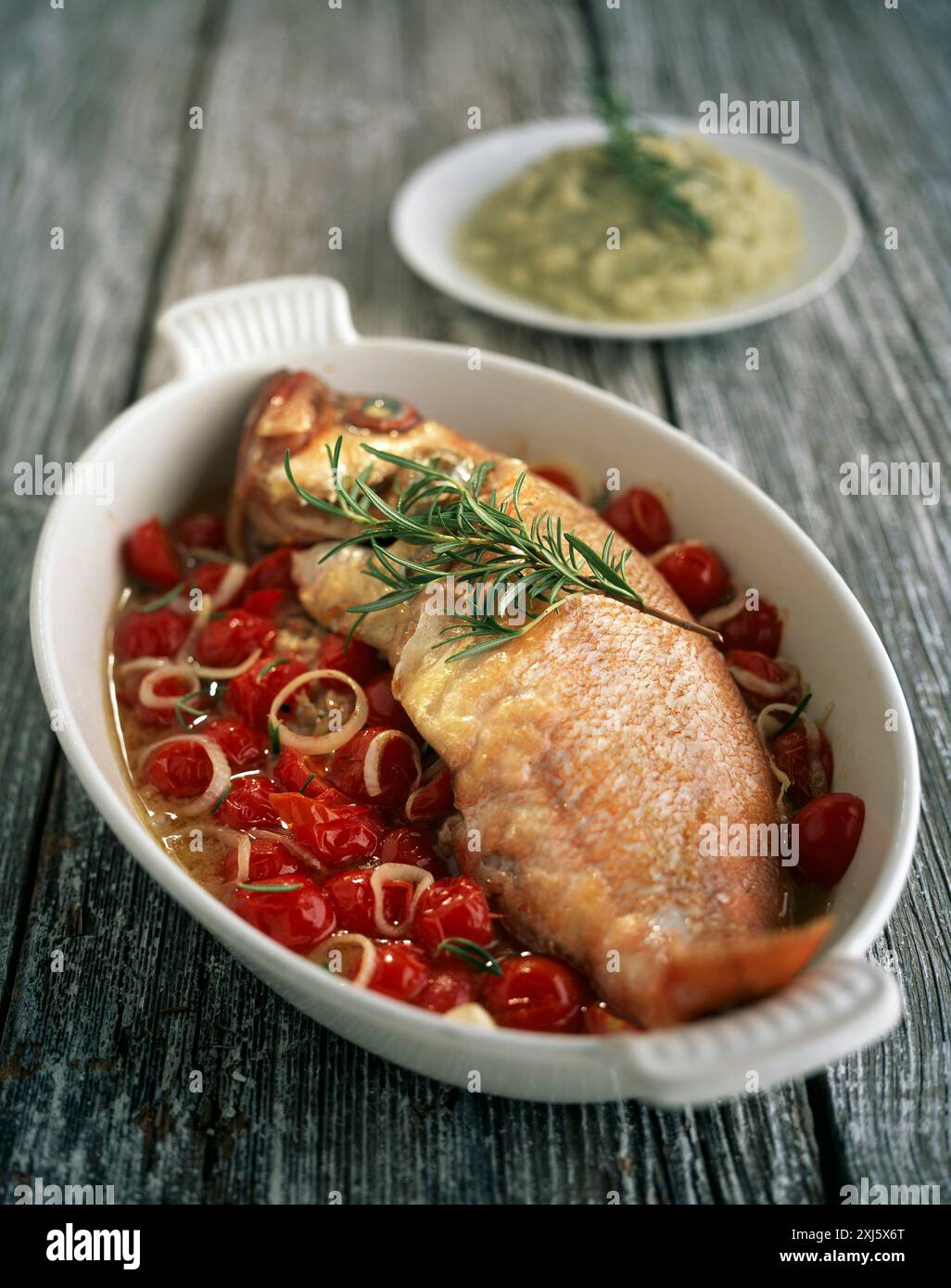 Roast red mullet with tomatoes,pureed fennel with rosemary Stock Photo ...