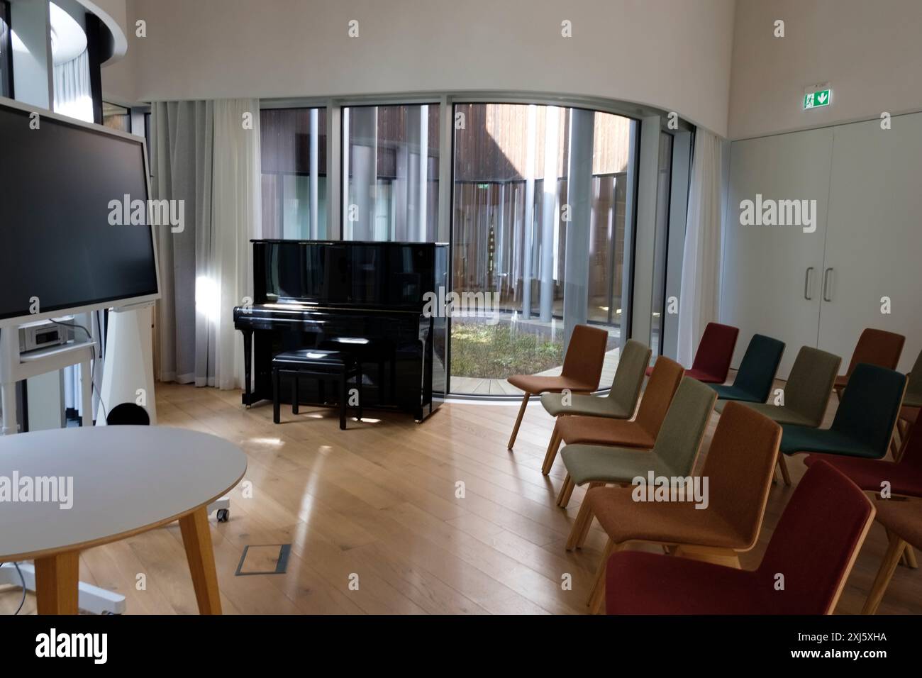 Small recital/class room with piano and AV screen at the Arvo Pärt ...