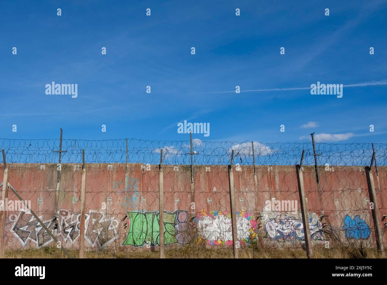Prison wall with barbed wire at the disused Murru Prison (Rummu Prison ...
