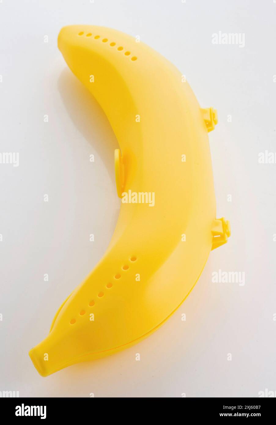 Plastic banana-shaped box Stock Photo - Alamy