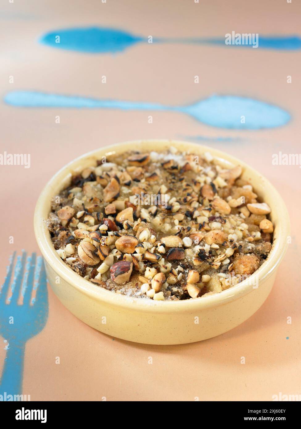 Reinette apple and dried fruit crumble Stock Photo - Alamy