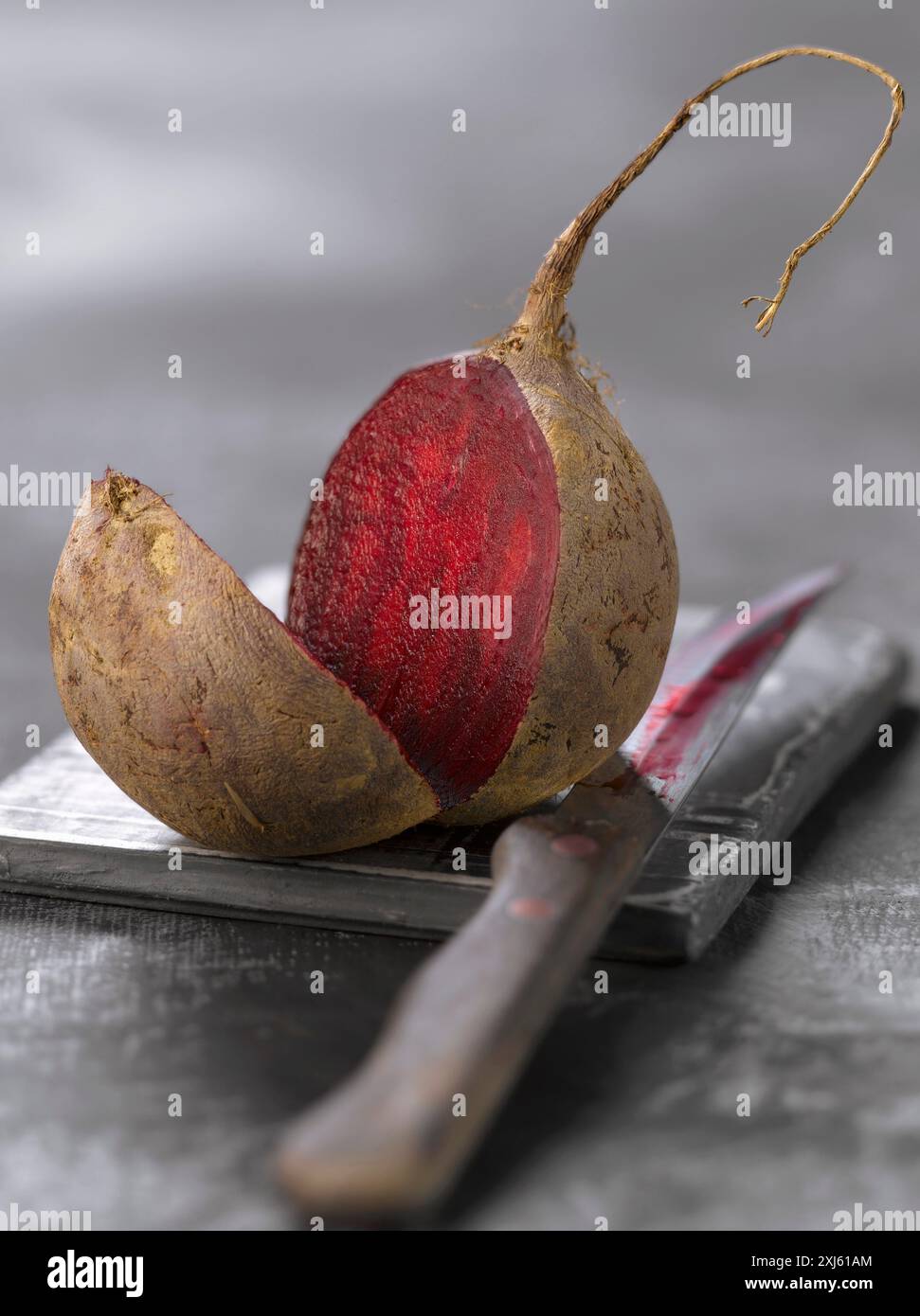 Raw beetroot cut in half Stock Photo - Alamy