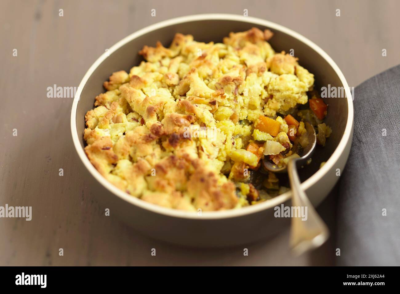 Vegetable and cream cheese savoury crumble Stock Photo - Alamy