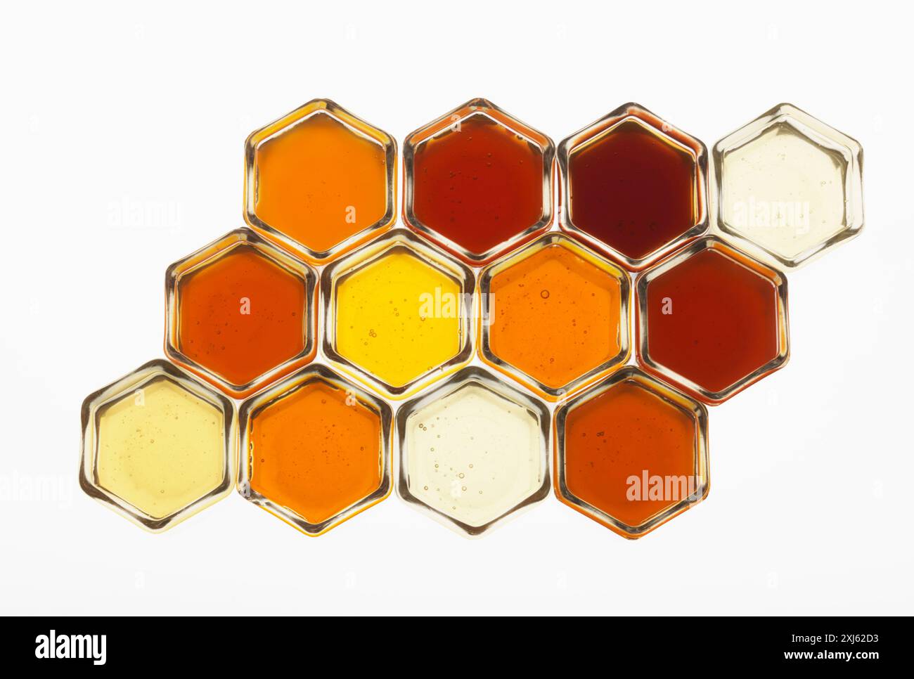 Composition with pots of honey Stock Photo - Alamy