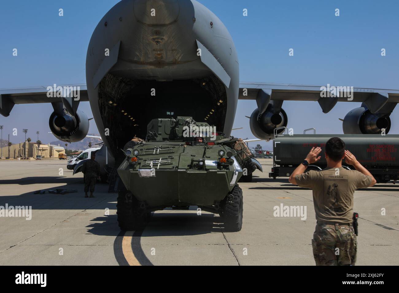 A U.S. Marine with 1st Light Armored Reconnaissance Battalion, 1st ...