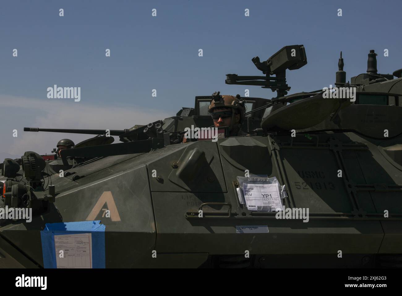 A U.S. Marine with 1st Light Armored Reconnaissance Battalion, 1st ...