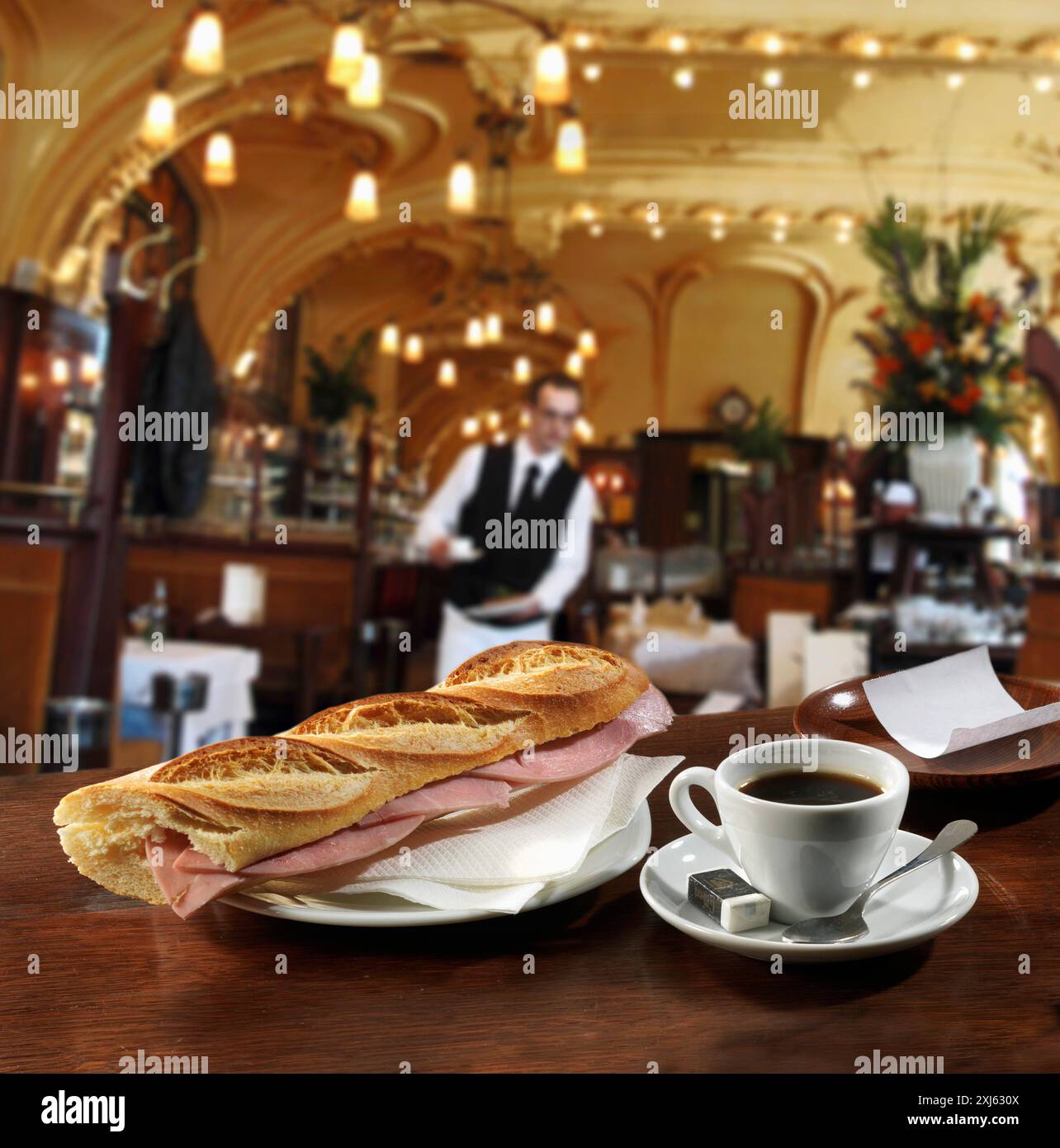 Ham sandwich and a cup of coffee on the bar in a Brasserie Stock Photo ...