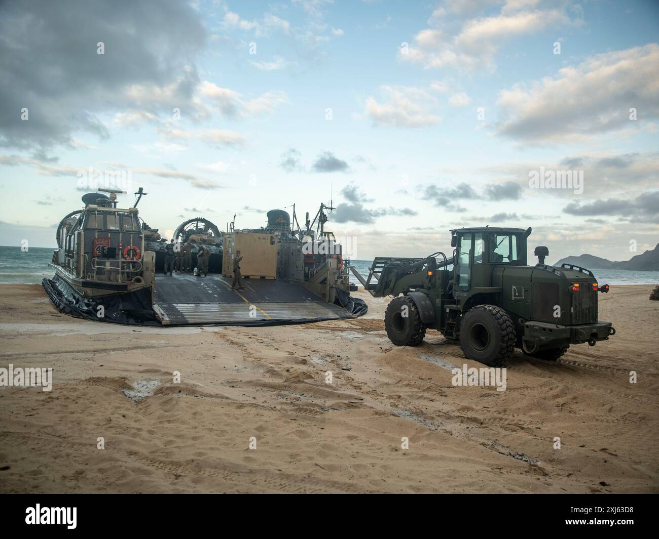 A U.S. Marine Corps 624-KR tractor, rubber-tired, articulated steering ...