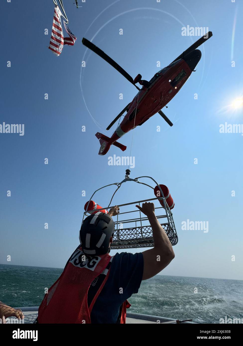 U.S. Coast Guard Academy Cadet 3rd Class Ben Bonetto receives a rescue ...