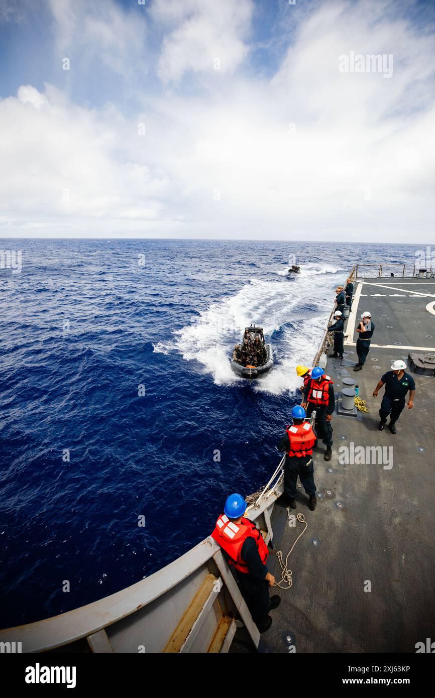 Sailors attached to the French Navy Frigate FS Bretagne (D655) prepare ...