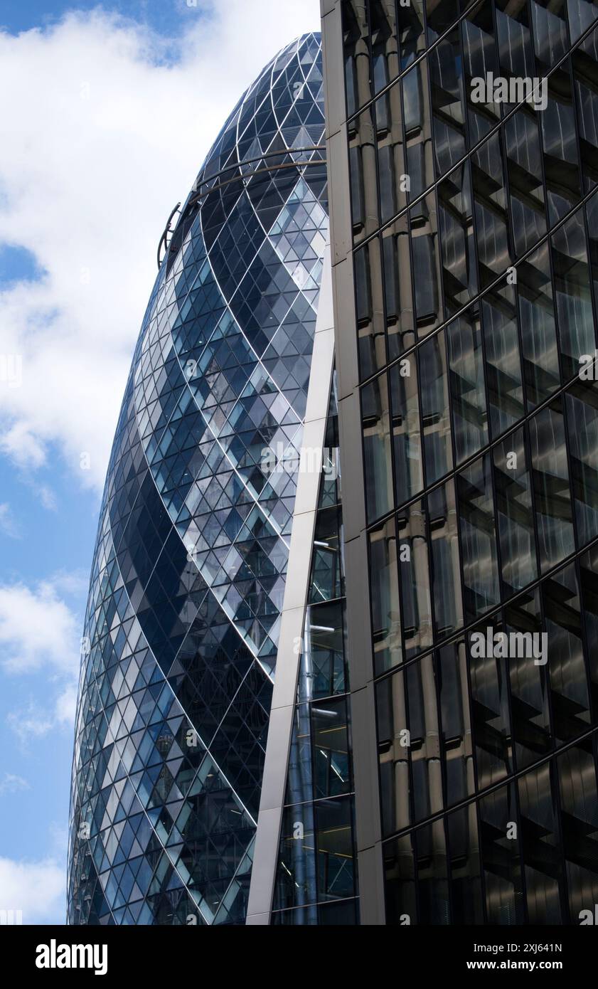The Gherkin, officially 30 St Mary Axe exterior view from the street ...