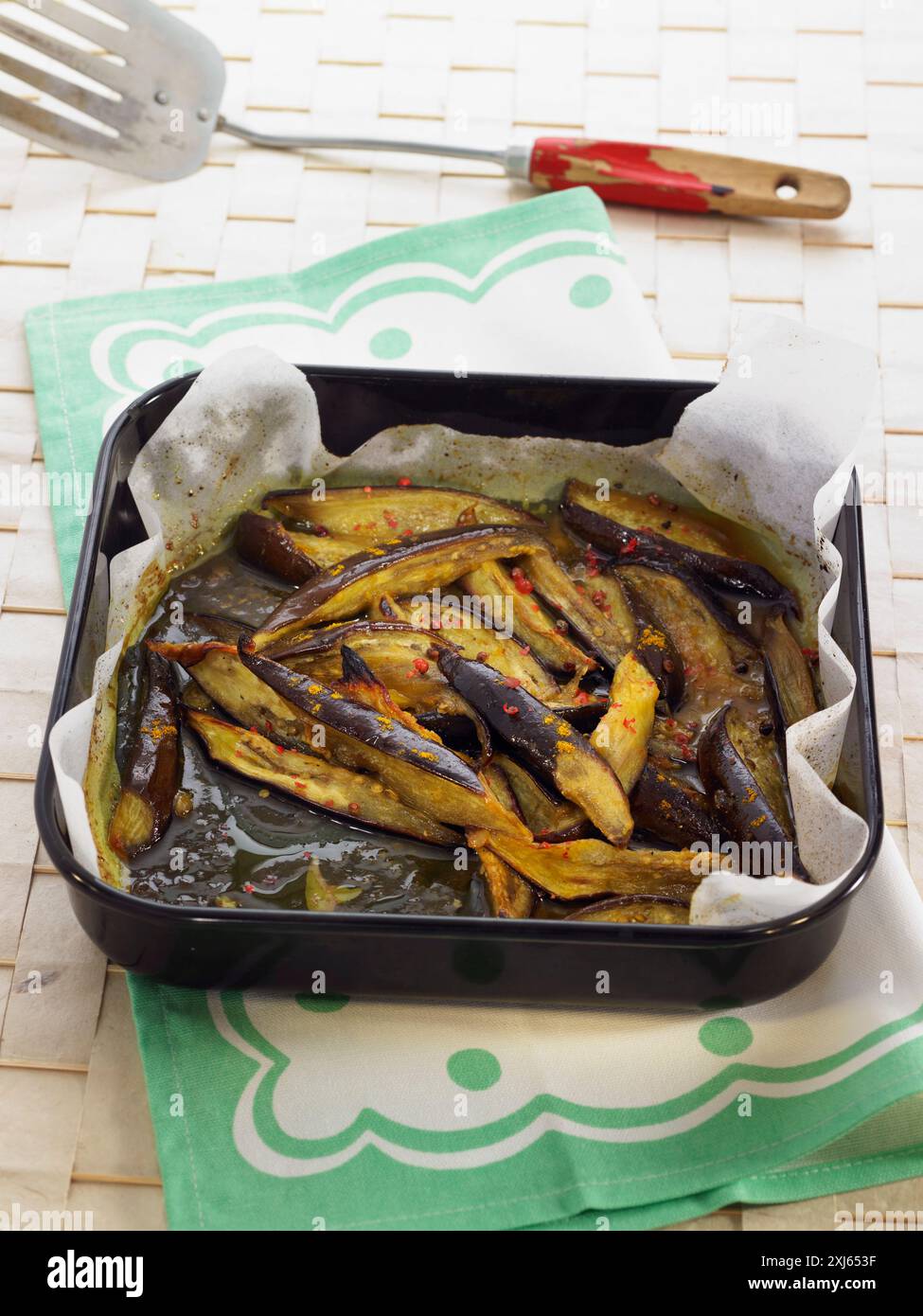 Eggplants with rice vinegar and Ras el hanout Stock Photo - Alamy