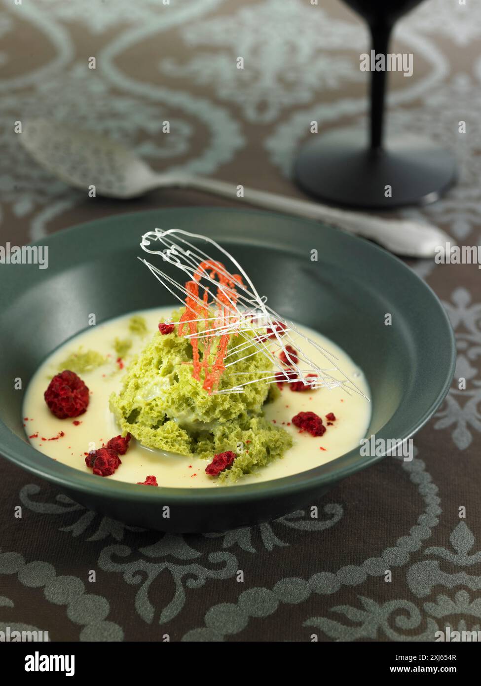 Crisp yoghurt and Matcha green tea pudding with white chocolate sauce ...