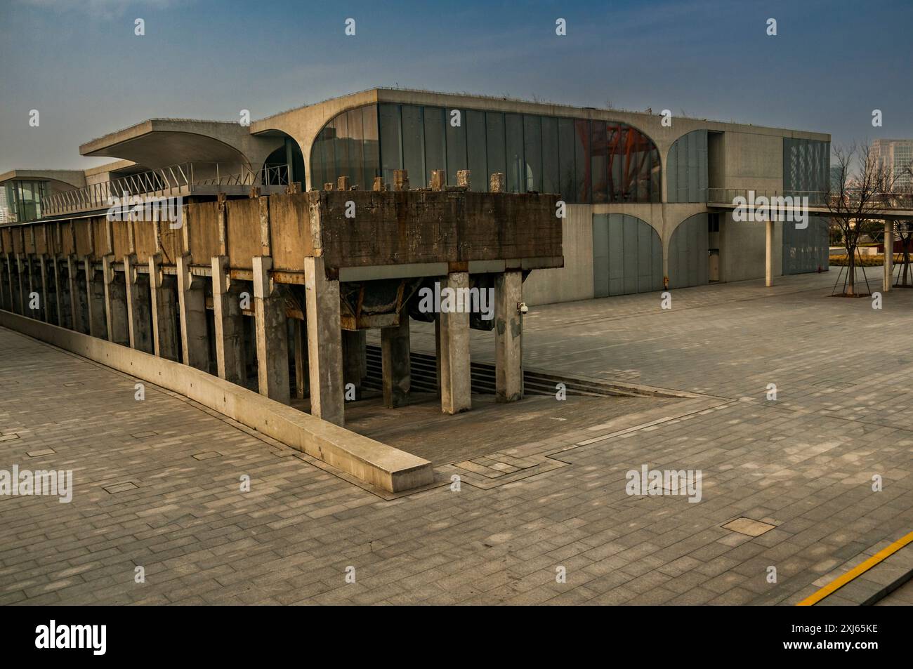 Long Museum West Bund and the preserved coal loading bridge hoppers ...