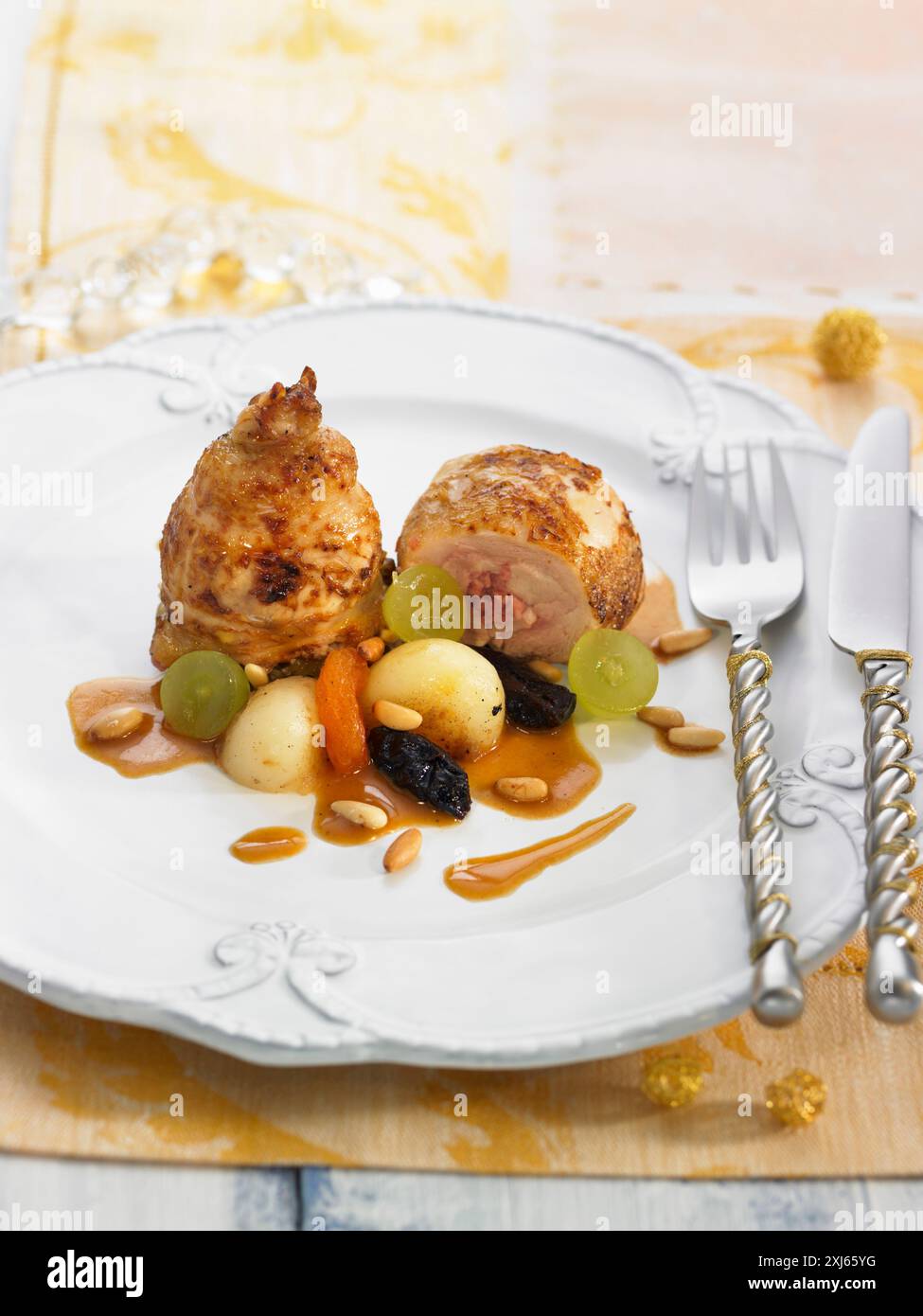 Turkey with truffles,prunes,dried apricots,grapes and pine nuts Stock ...