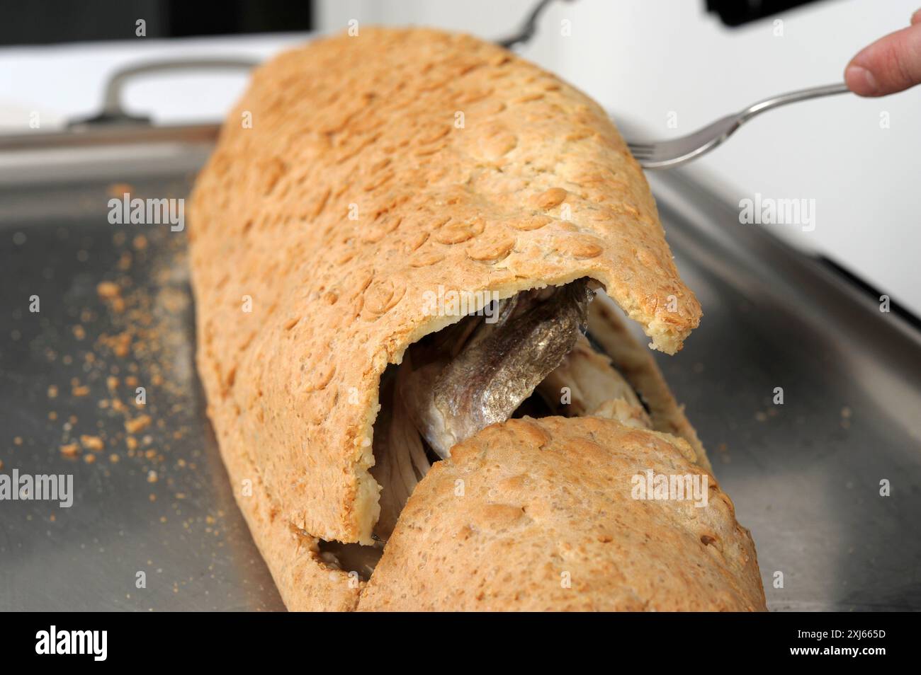 Bass in salt crust hi-res stock photography and images - Alamy