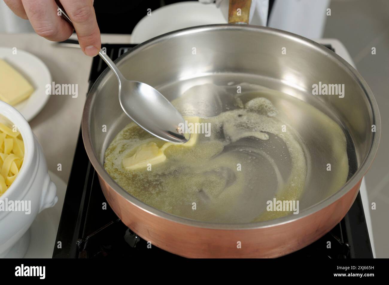 Butter pan melting hi-res stock photography and images - Alamy