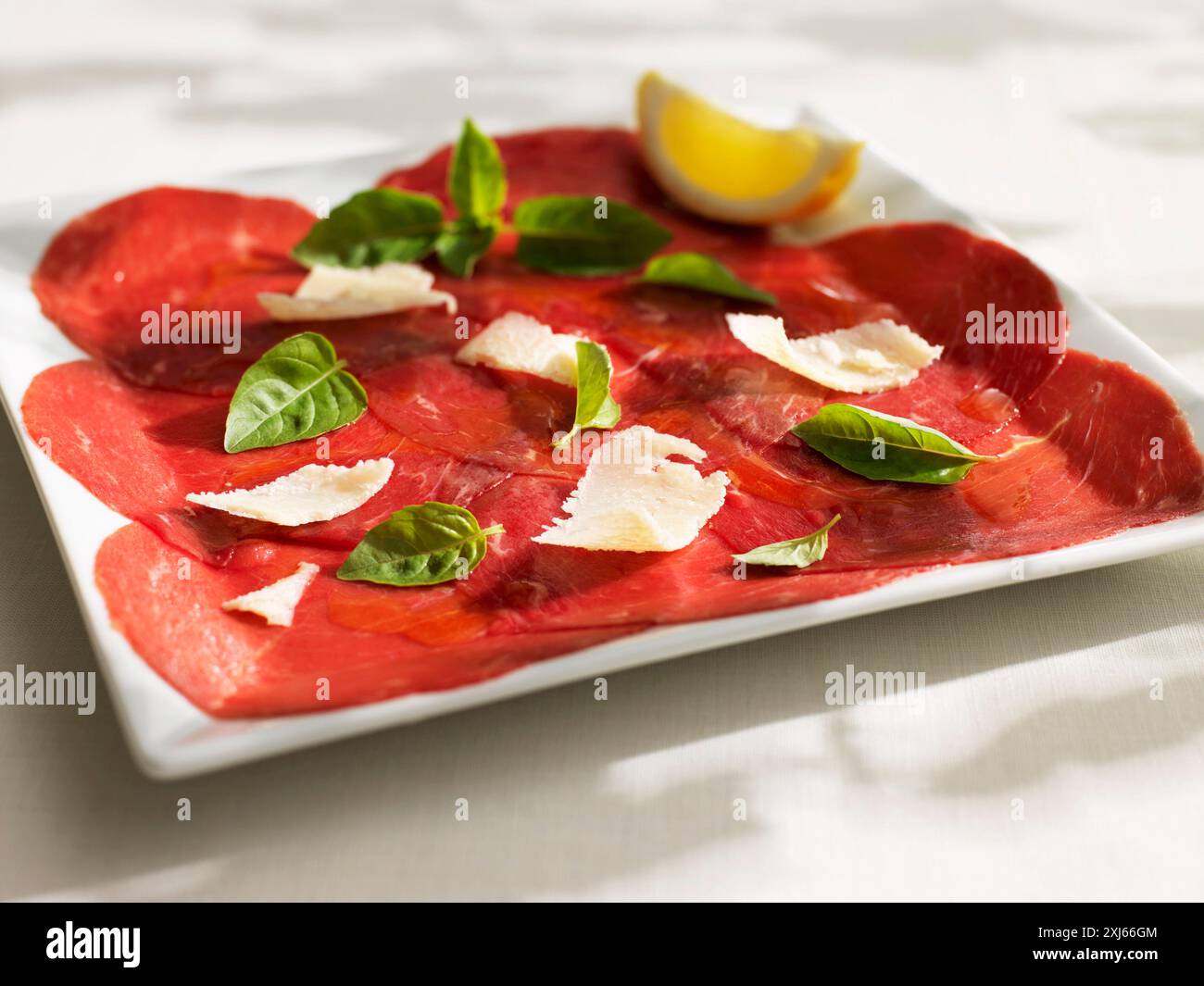 Carpaccio meat parmesan cheese hi-res stock photography and images - Alamy