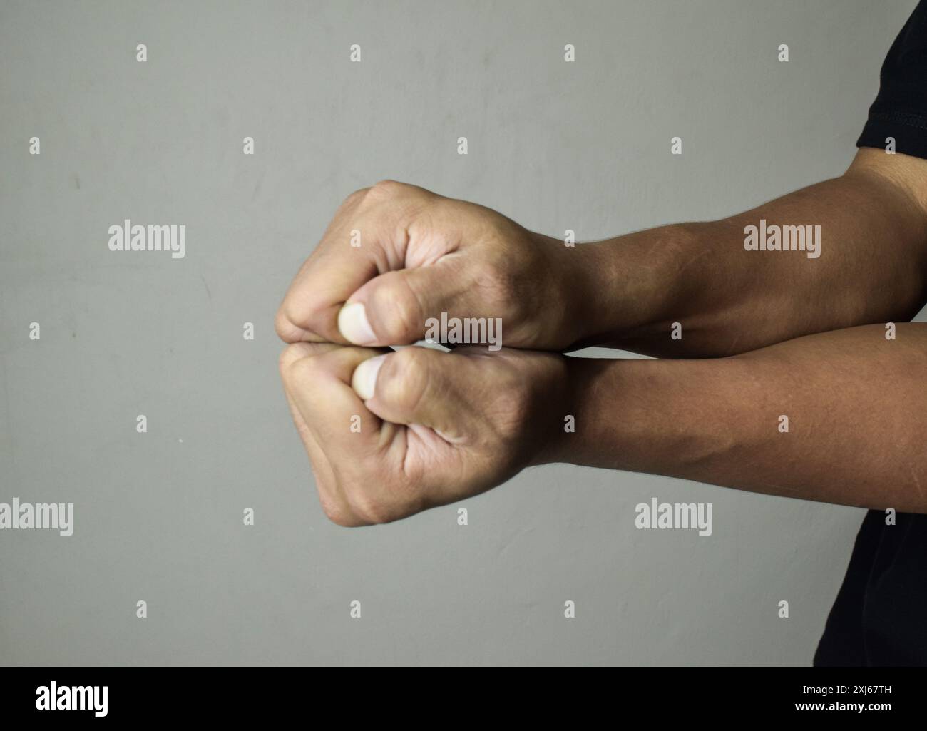 Two hands clasped together illustrating unity and teamwork. Gesture of ...