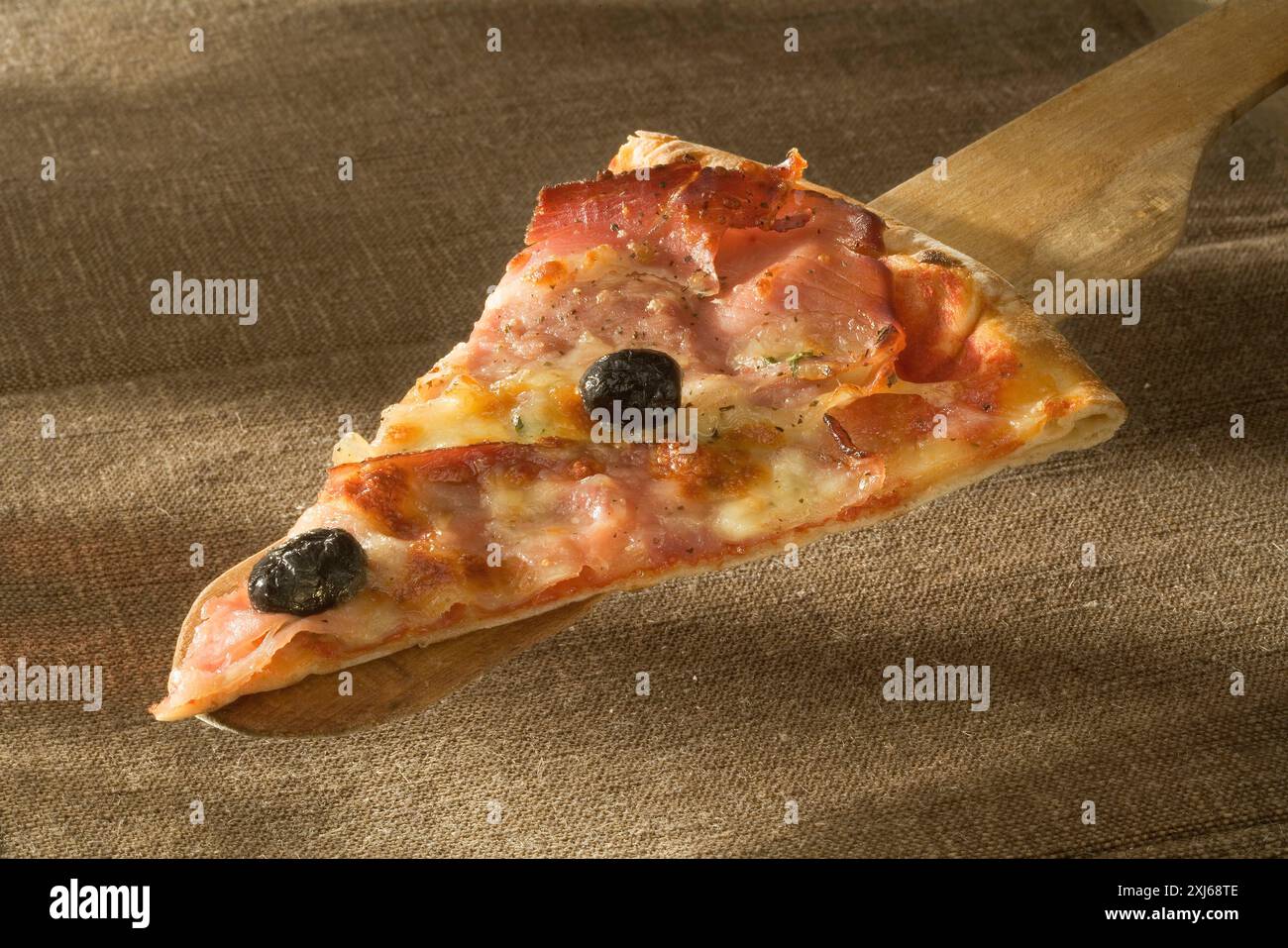 Slice of ham pizza Stock Photo - Alamy