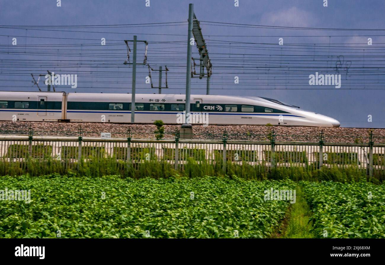 A Chinese CRRC built CRH380A bullet train leaves Jiaxing South Station ...