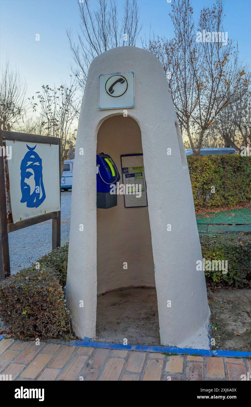 Unusual Telephone box in a covered pod made of concrete Stock Photo - Alamy