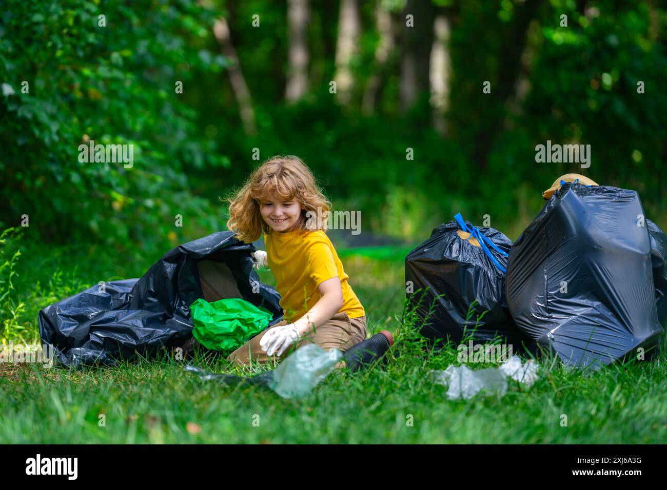 Trash park children gloves hi-res stock photography and images - Alamy
