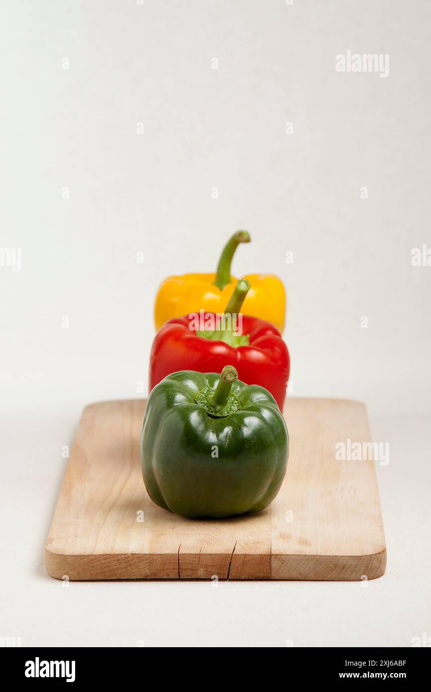 Three different colored peppers Stock Photo - Alamy