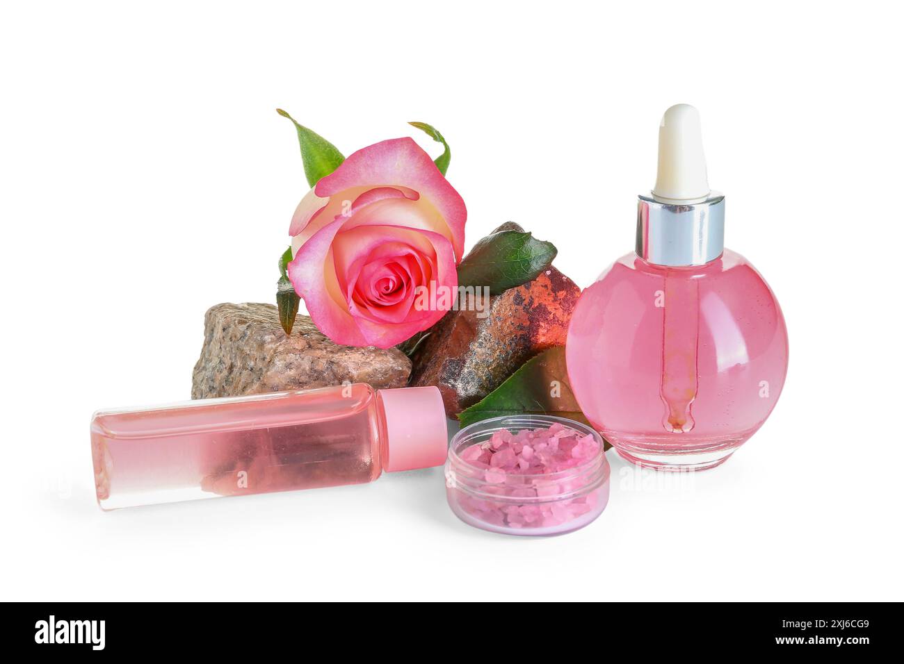 Bottles of cosmetic oil with rose extract, flower and stones on white ...