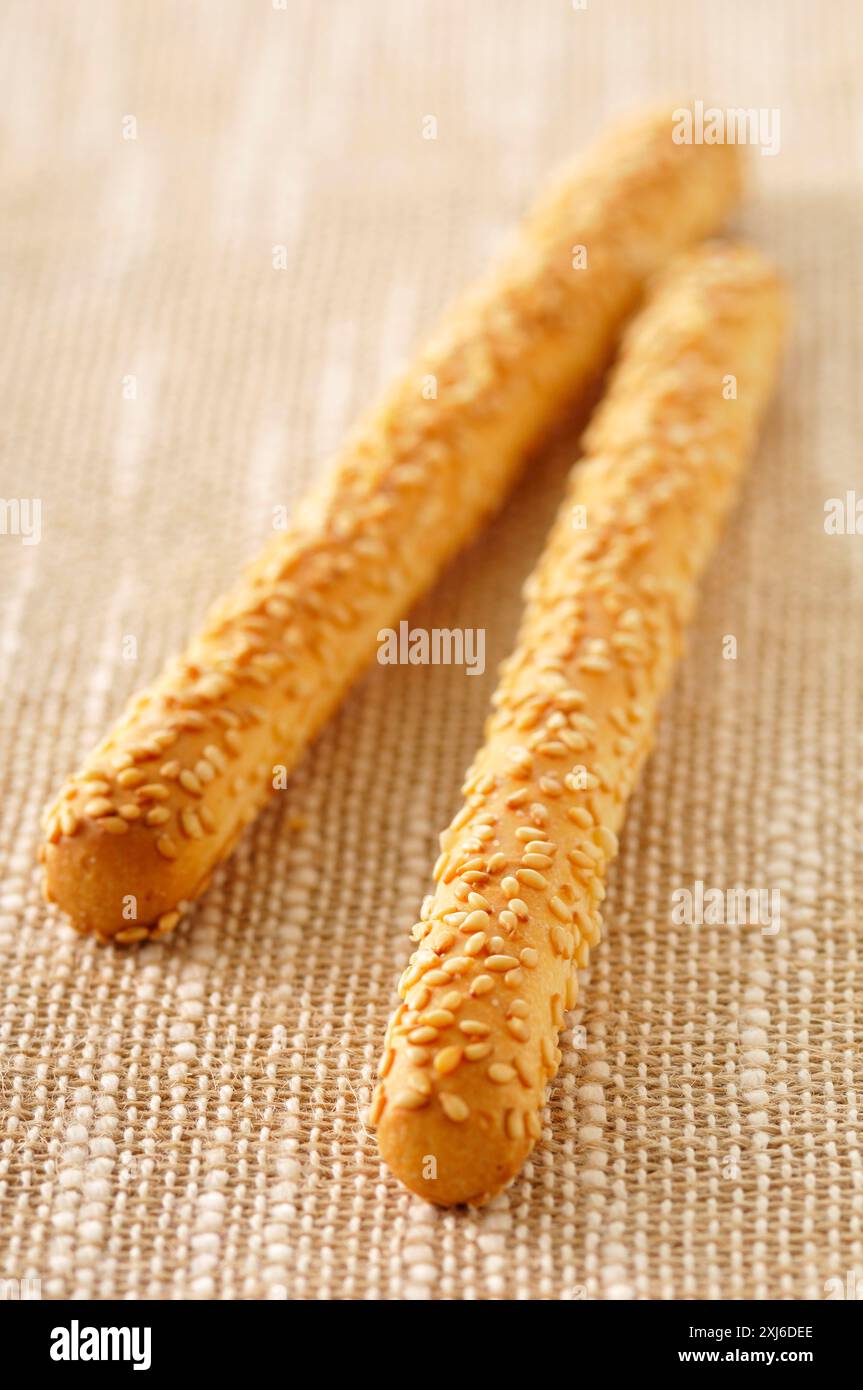 Sesame seed breadsticks Stock Photo - Alamy