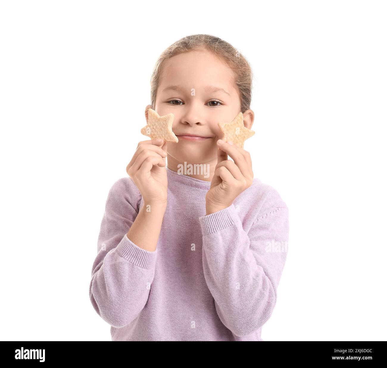 Cute little girl with tasty cookies on white background Stock Photo - Alamy
