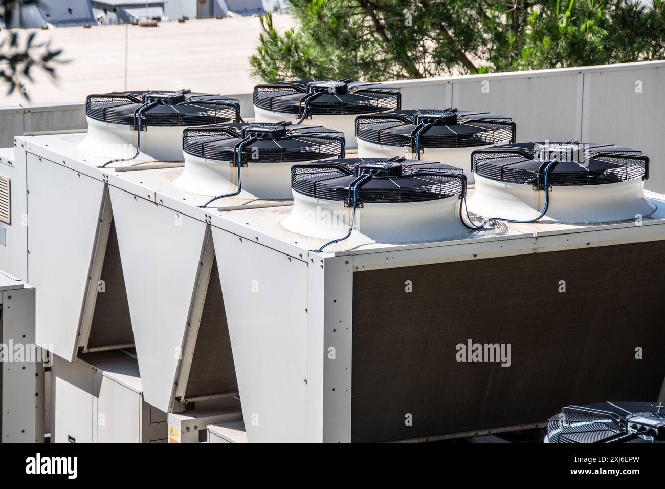 Commercial HVAC system with multiple air conditioning units on a ... Commercial HVAC system with multiple air conditioning units on a ...