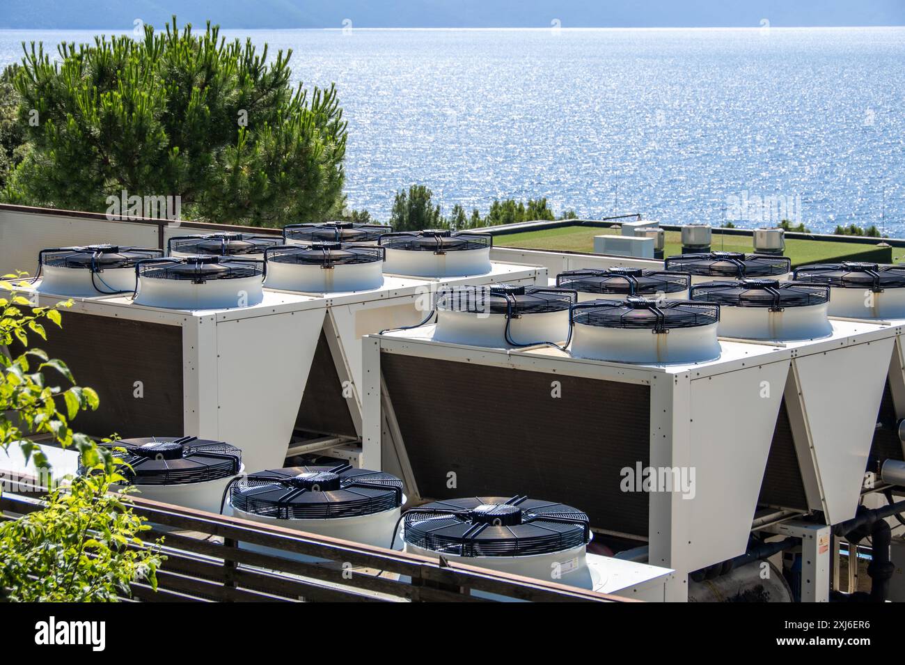 Rows of large commercial HVAC units on a rooftop, strategically ...