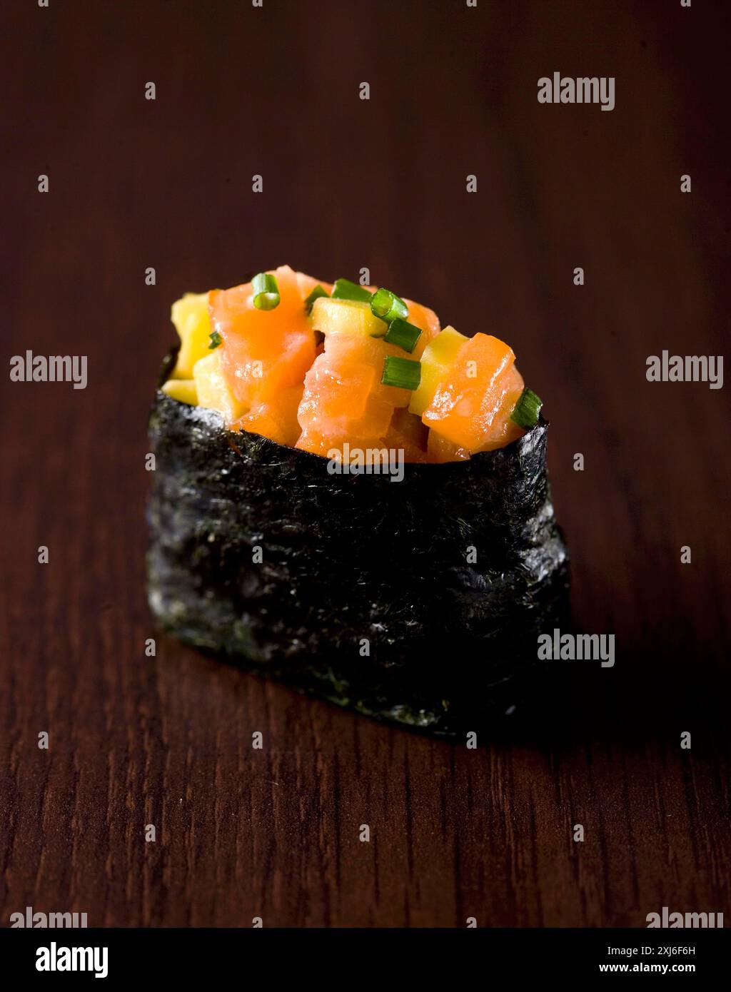 Salmon and marinated radish Gunkan Stock Photo - Alamy