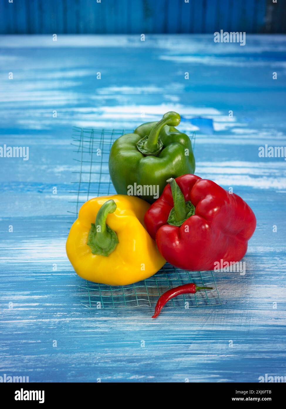 Three different colored bell peppers Stock Photo - Alamy
